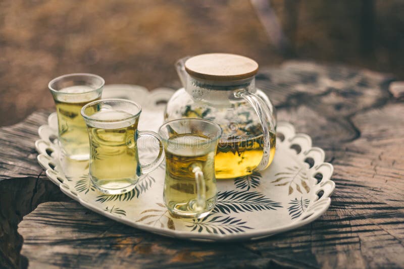 Kettle with herbal tea stock photo. Image of chrome - 230998638