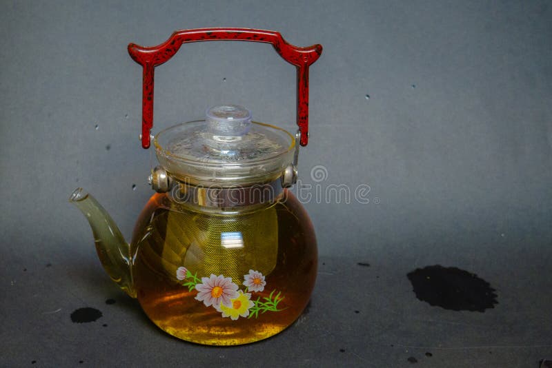 A Kettle Next To Pressed Green Tea with Mint Stock Image - Image of ...