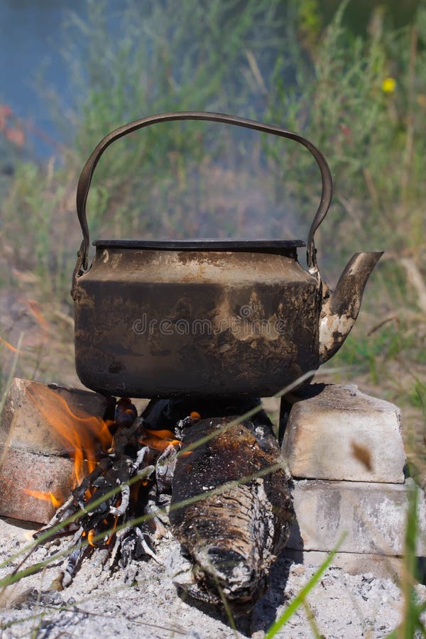 Kettle in Soot Hung Over the Fire on Nature Stock Photo - Image of ...