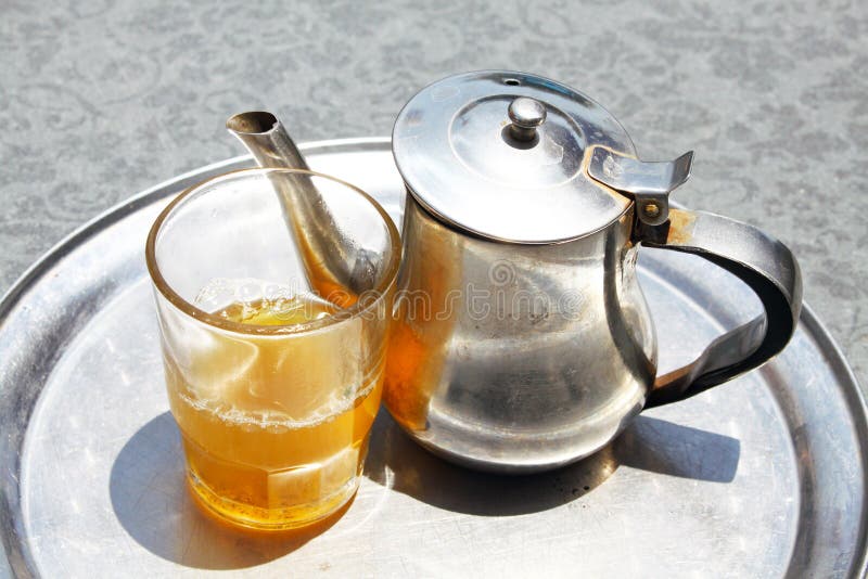 A kettle with a tea glass stock photo. Image of rabat - 27872580