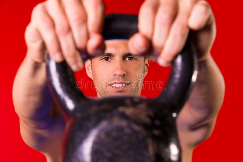 Kettlebell Man Portrait Looking through the Handle Stock Image - Image ...