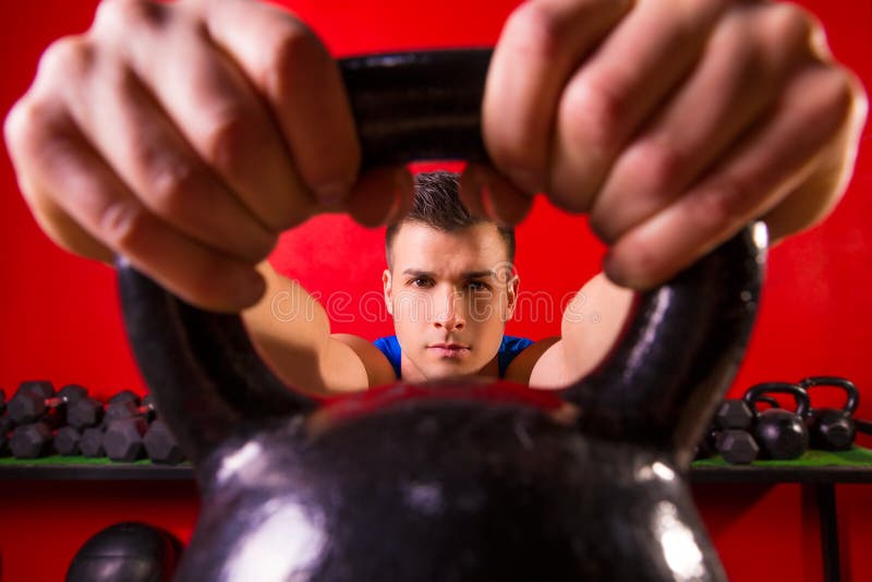 Kettlebell Man Portrait Looking through the Handle Stock Image - Image ...