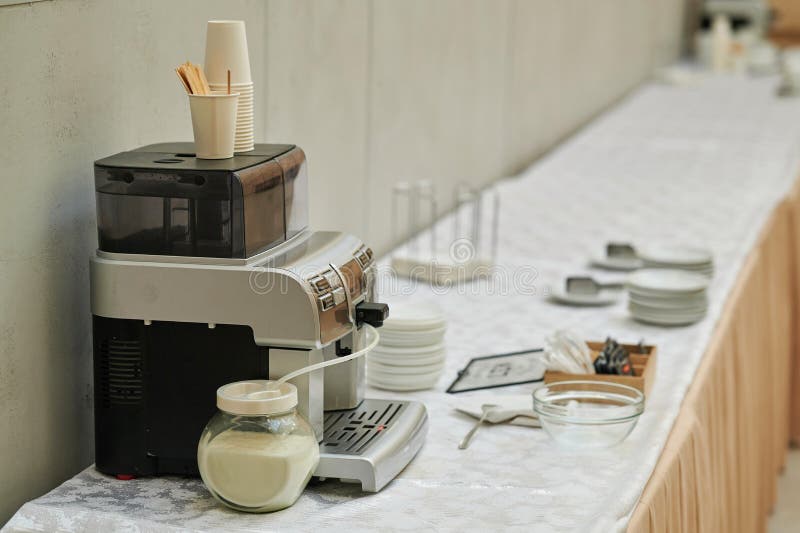 Kettles with Hot Water on the Table with Coffee Machine Stock Image ...