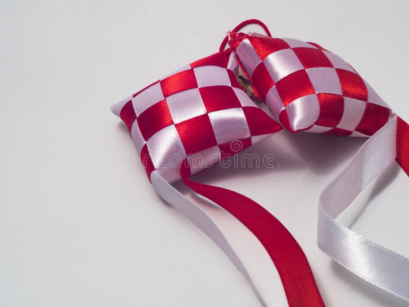 Ketupat Made of Red and White Ribbons on a White Background Stock Image ...