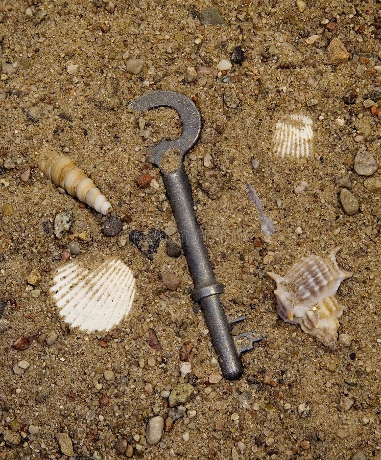 Key in sand stock photo. Image of beach, lost, riches - 3815572