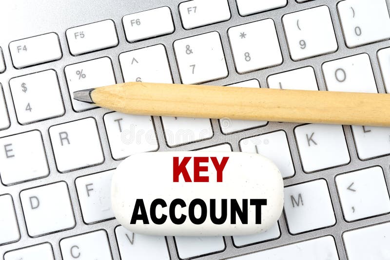 KEY ACCOUNT Text on Eraser with Pencil on Keyboard Stock Image - Image ...