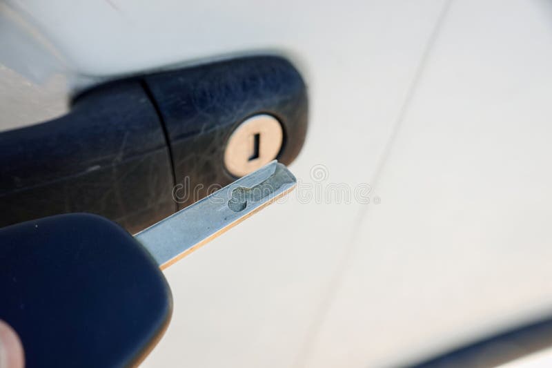 A Key is Being Used To Open a Car Door Stock Photo - Image of ...