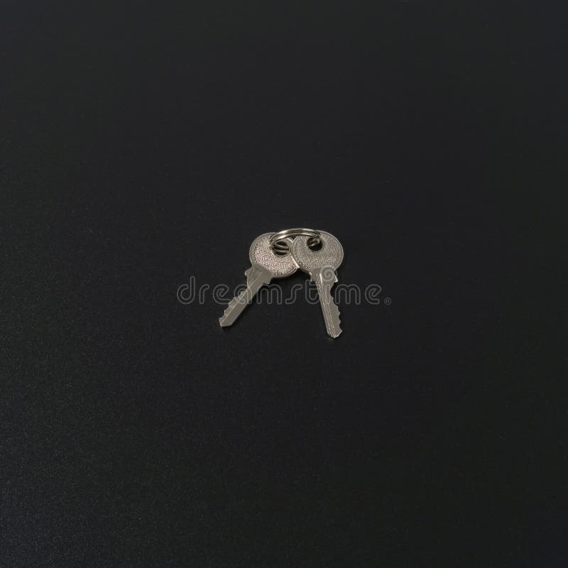 Key on black background stock image. Image of safety - 350598741