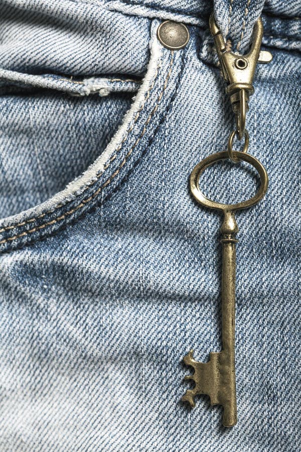 The key on a blue jeans stock photo. Image of metallic - 29182216
