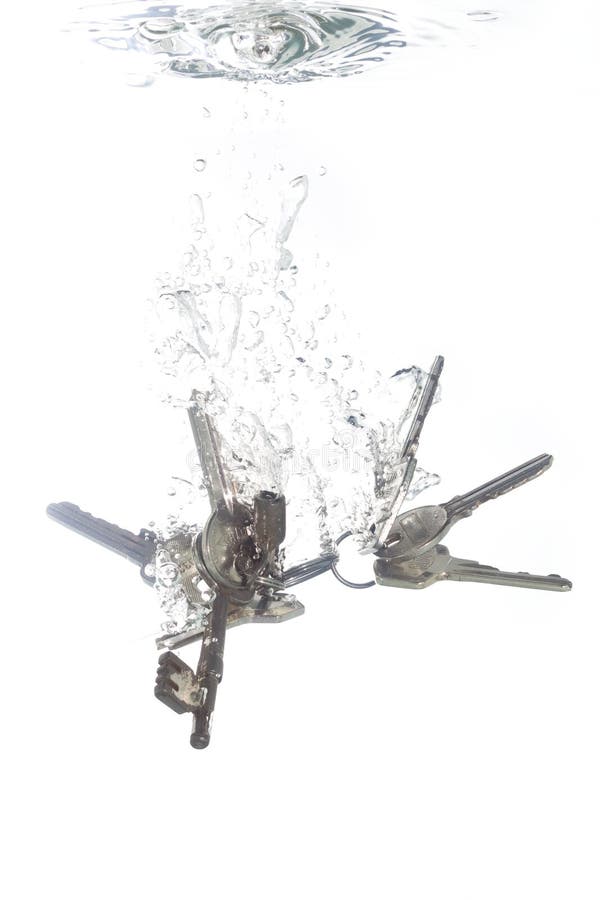 A Key Chain Falling into Water Stock Photo - Image of speed, mineral ...