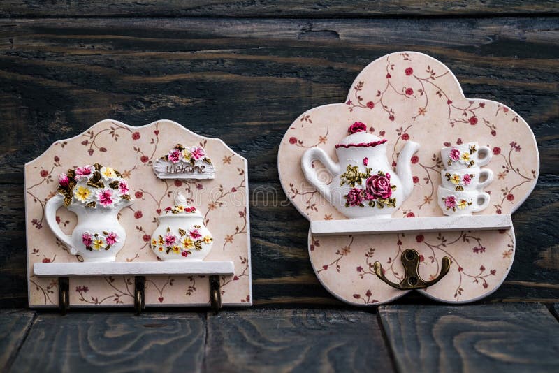 Key Chain Holders with Kitchen Theme on Blue Wooden Background Stock ...