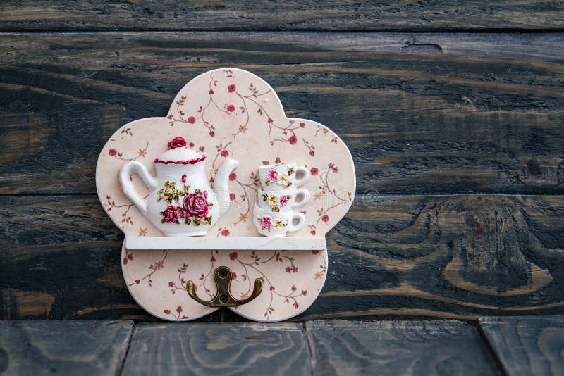 Key Chain Holders with Kitchen Theme on Blue Wooden Background Stock ...