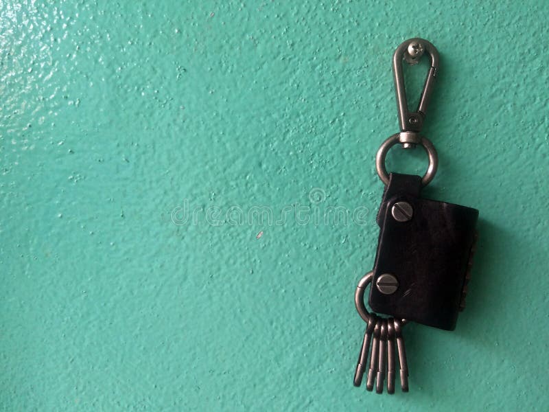 Key Chain Leather on Green Wall Concrete Stock Photo - Image of ...