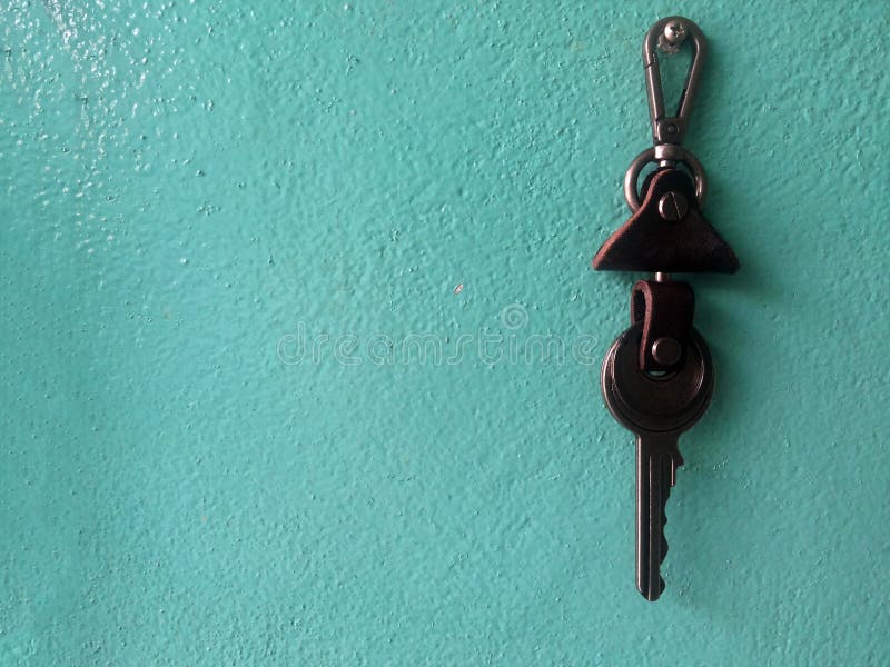 Key Chain Leather on Green Wall Concrete Stock Photo - Image of wall ...