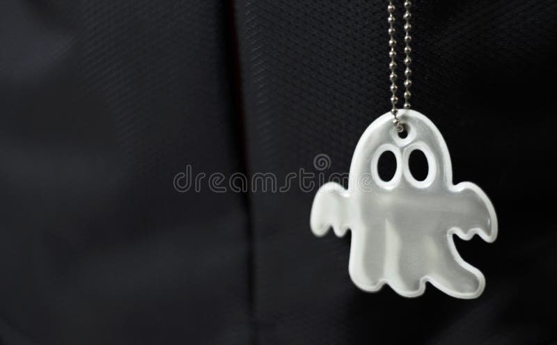 Key Chain Reflective in a Ghost Pattern Form on Black Background Stock ...