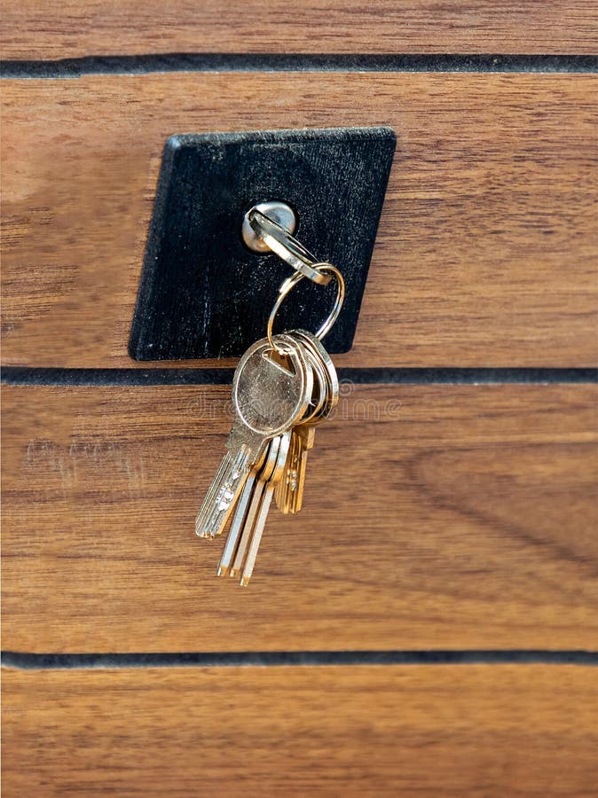 Key in door key hole stock photo. Image of domestic - 347186222