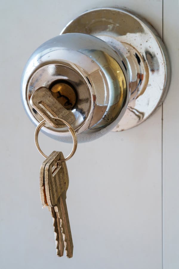 Key in door lock stock photo. Image of green, architecture - 157729502