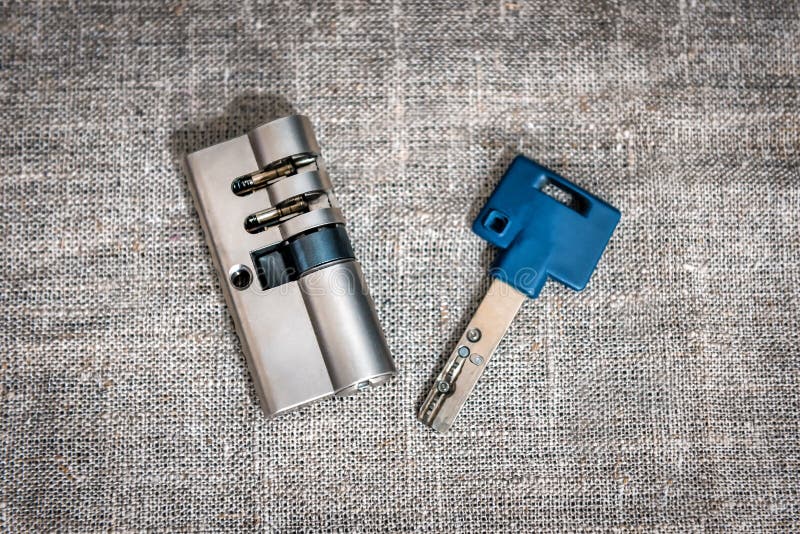 Key and door lock cylinder stock photo. Image of access - 173970724