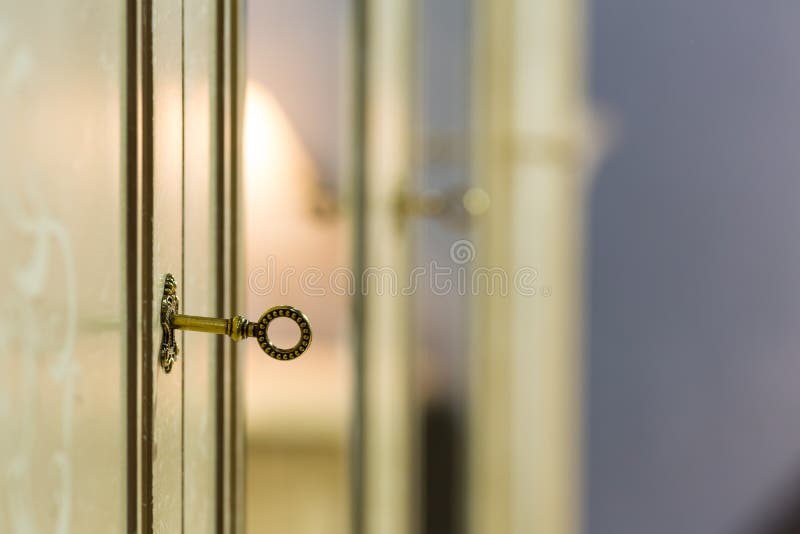 Key in the door lock stock photo. Image of antique, restricted - 53595730