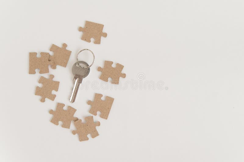 Key and Eight Pieces of Jigsaw Puzzle Stock Image - Image of piece ...