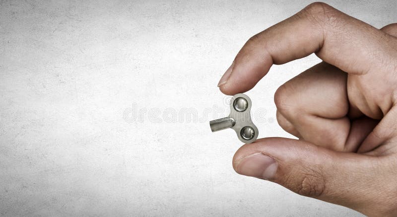 Key between fingers stock image. Image of hand, tiny - 72390295