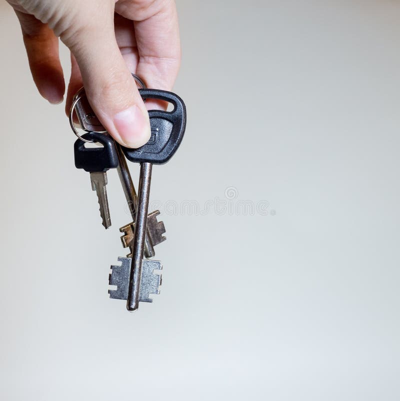 Key in the hand stock photo. Image of human, isolated - 48588402