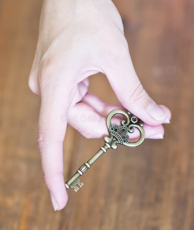 Key in a hand stock image. Image of palm, open, gold - 57514939