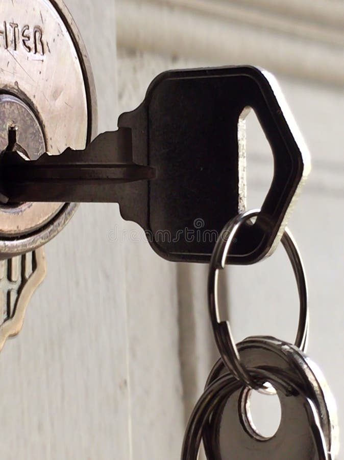 Key hang on door lock stock photo. Image of hand, light - 116211192
