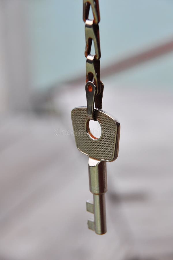 Key hanging on chain stock photo. Image of unlock, security - 7575940