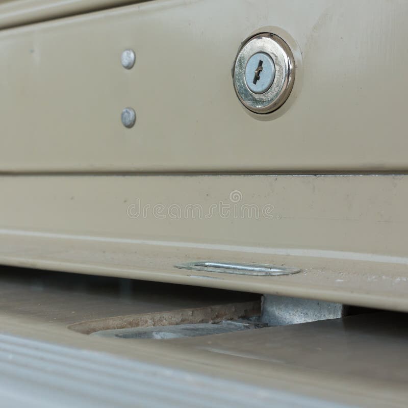 Key hole on roller door stock photo. Image of shutter - 92115464