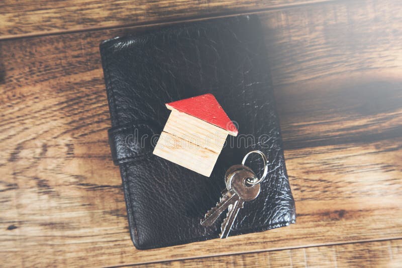 Key and House Model on Wallet Stock Photo - Image of table, legal ...