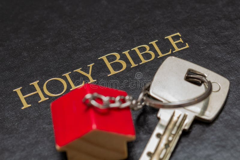 Key with House Shaped Key Chain on Bible Stock Photo - Image of real ...