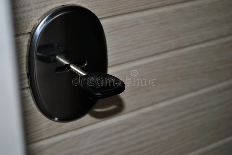 The Key Inserted in the Door Lock Stock Image - Image of wood, steel ...