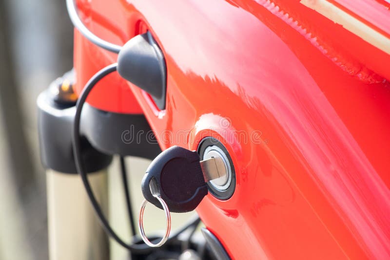The Key is Inserted into the Keyhole on the Frame of the E-bike ...