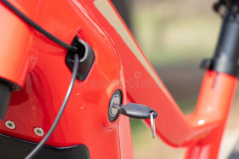 The Key is Inserted into the Keyhole on the Frame of the E-bike ...