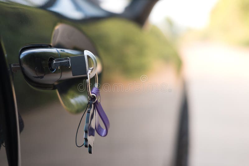 Key inserts on door handle stock photo. Image of automobile - 109309580