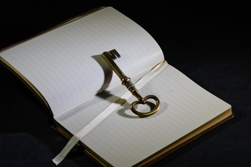 Key on journal or notebook stock image. Image of blank - 96497651