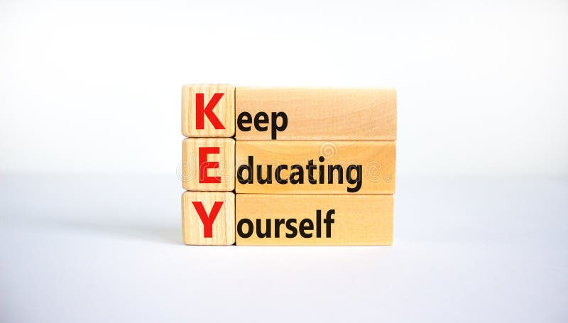 KEY, Keep Educating Yourself Symbol. Wooden Blocks with Words `KEY ...