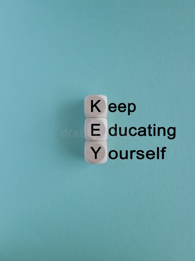 KEY, Keep Educating Yourself Symbol. Wooden Cubes with Words KEY, Keep ...
