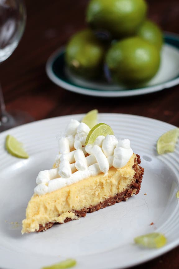Key Lime Pie on Wood Table with Limes Stock Image - Image of cake, bake ...
