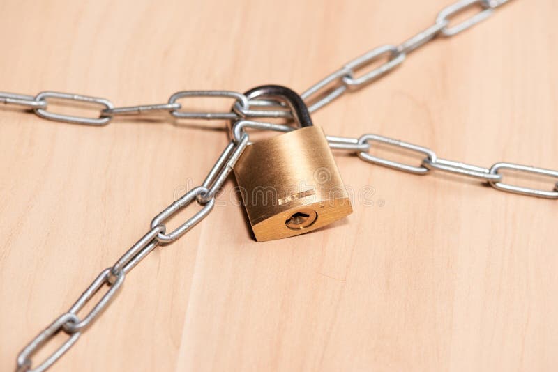Key Lock Locked with a Chain on Table Stock Photo - Image of wooden ...