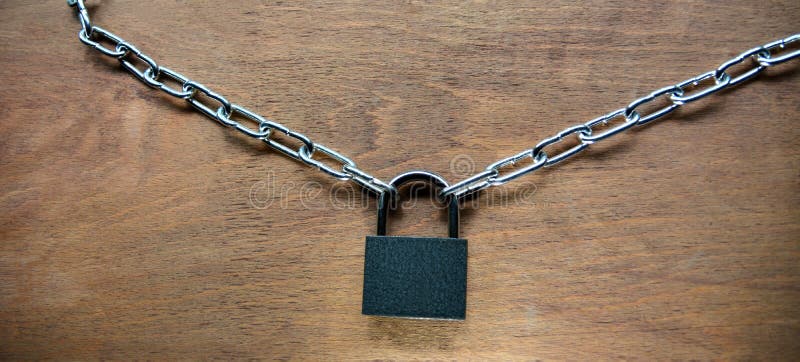 Key Lock Locked with a Chain on Table Stock Image - Image of chain ...