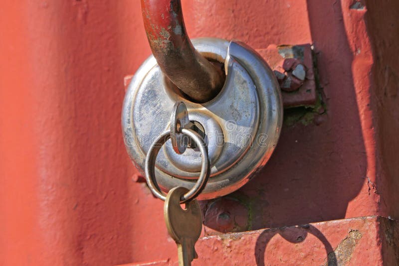 Key in a Lock on Red Metal Door Stock Photo - Image of safety, safe ...