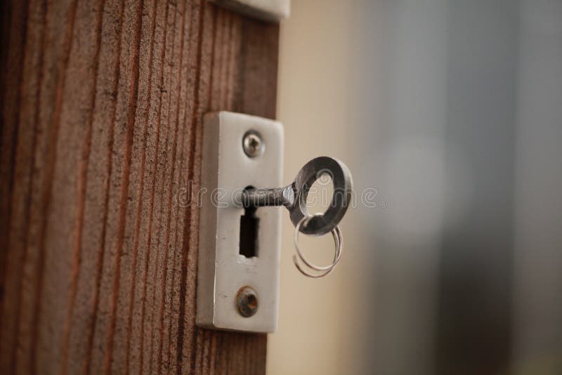 Old Key in the Lock of the Wooden Door Stock Image - Image of metal ...