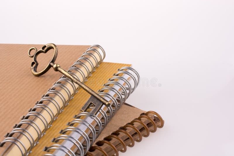 Key on notebooks stock image. Image of school, paper - 119540503
