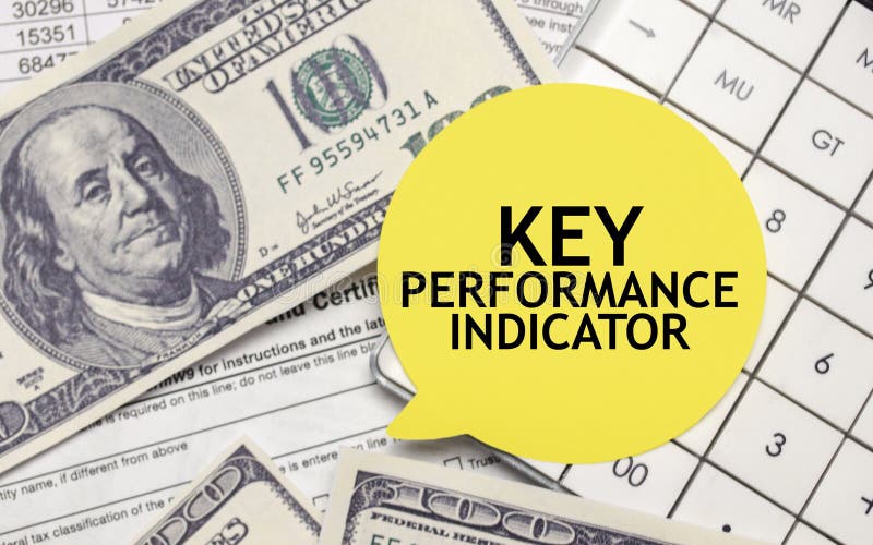KEY PERFORMANCE INDICATOR Words on Yellow Sticker with Dollars and ...