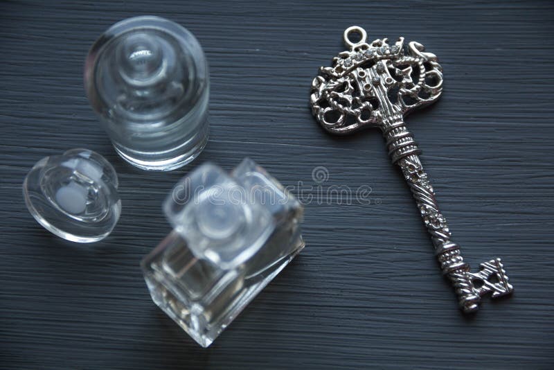 Key and Perfume on Wood Background Stock Image - Image of love ...