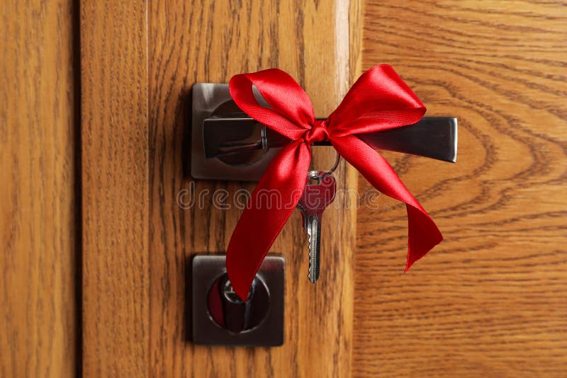 Key with Bow on Door Handle, Closeup View. Housewarming Party Stock ...