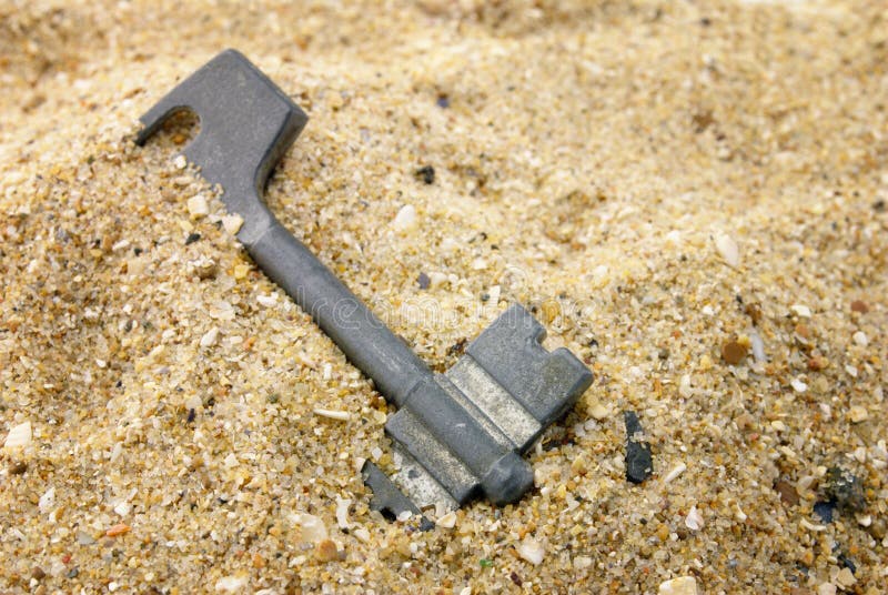 Key in sand stock photo. Image of beach, lost, riches - 3815572
