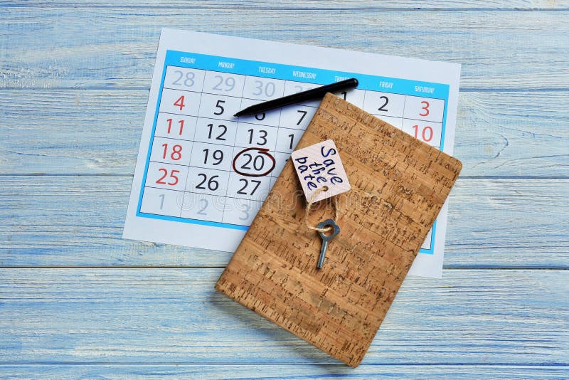 Key with "Save the Date " Tag, Notebook and Calendar on Table Stock ...